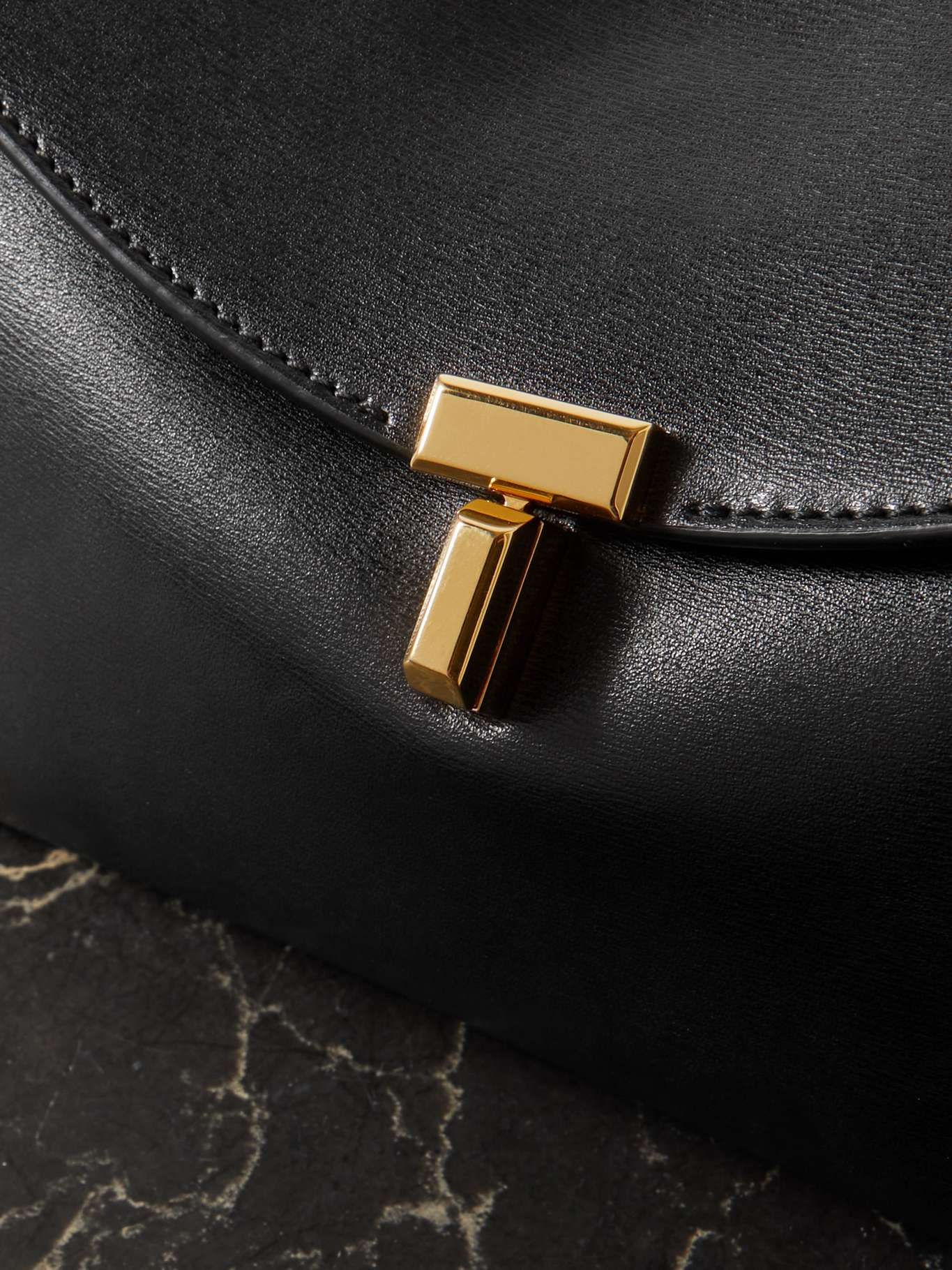 TOTEME T-Lock leather clutch | NET-A-PORTER
