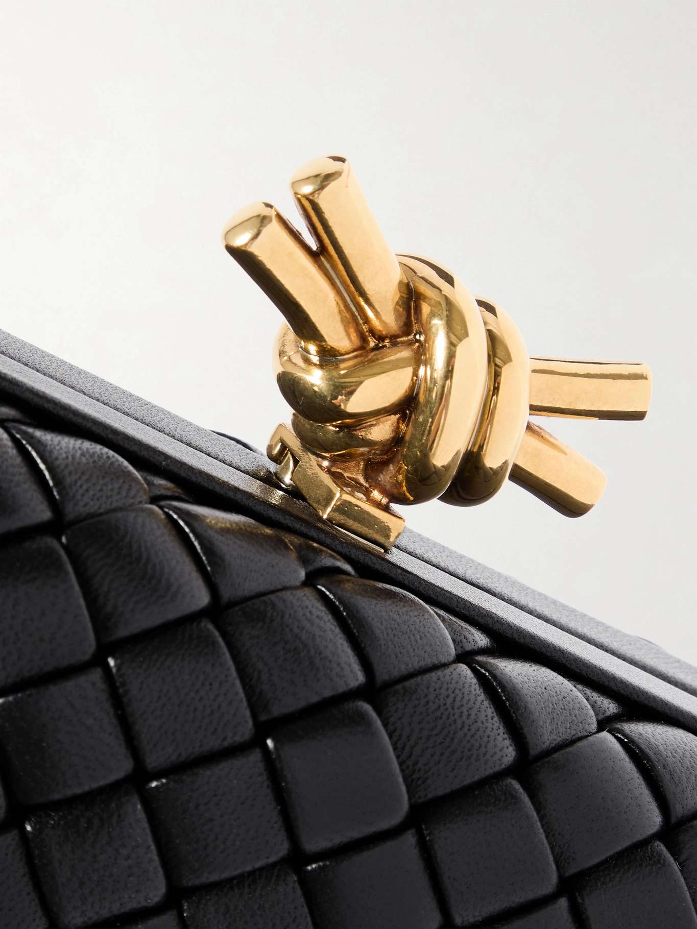 BOTTEGA VENETA Knot padded intrecciato leather clutch | NET-A-PORTER