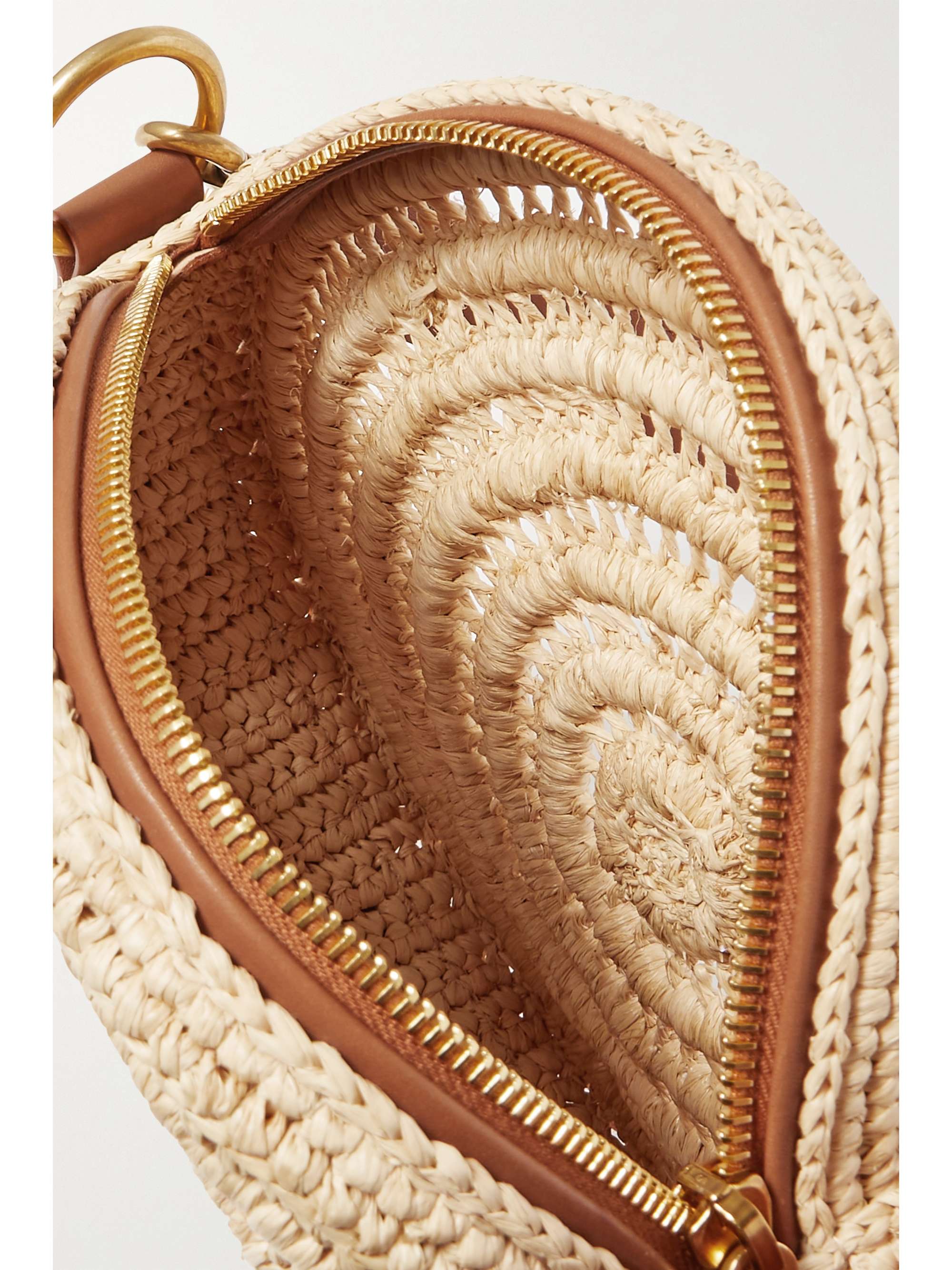 Neutral Cassandre Round leather-trimmed raffia shoulder bag | SAINT ...