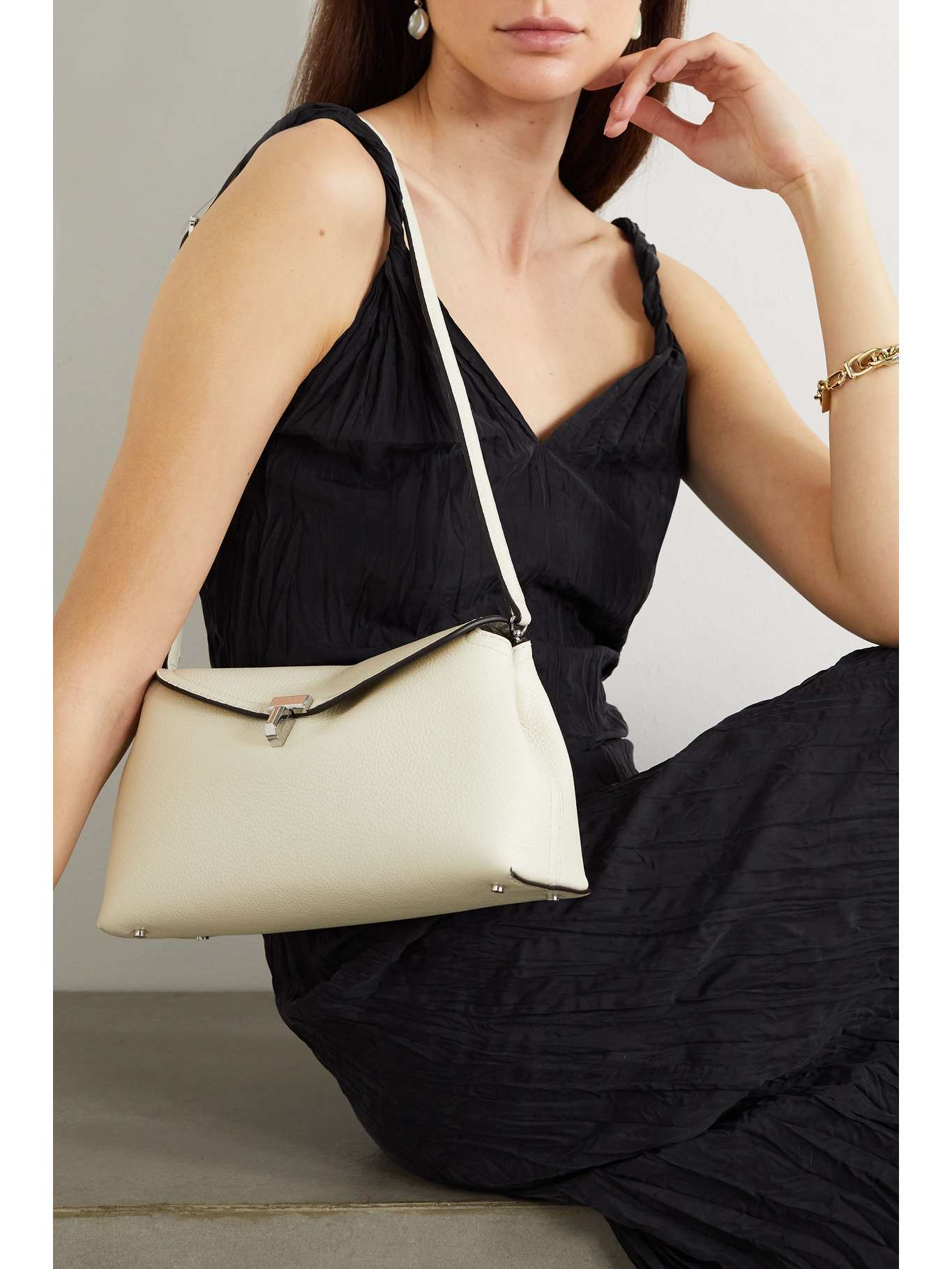 TOTEME T-Lock textured-leather clutch | NET-A-PORTER