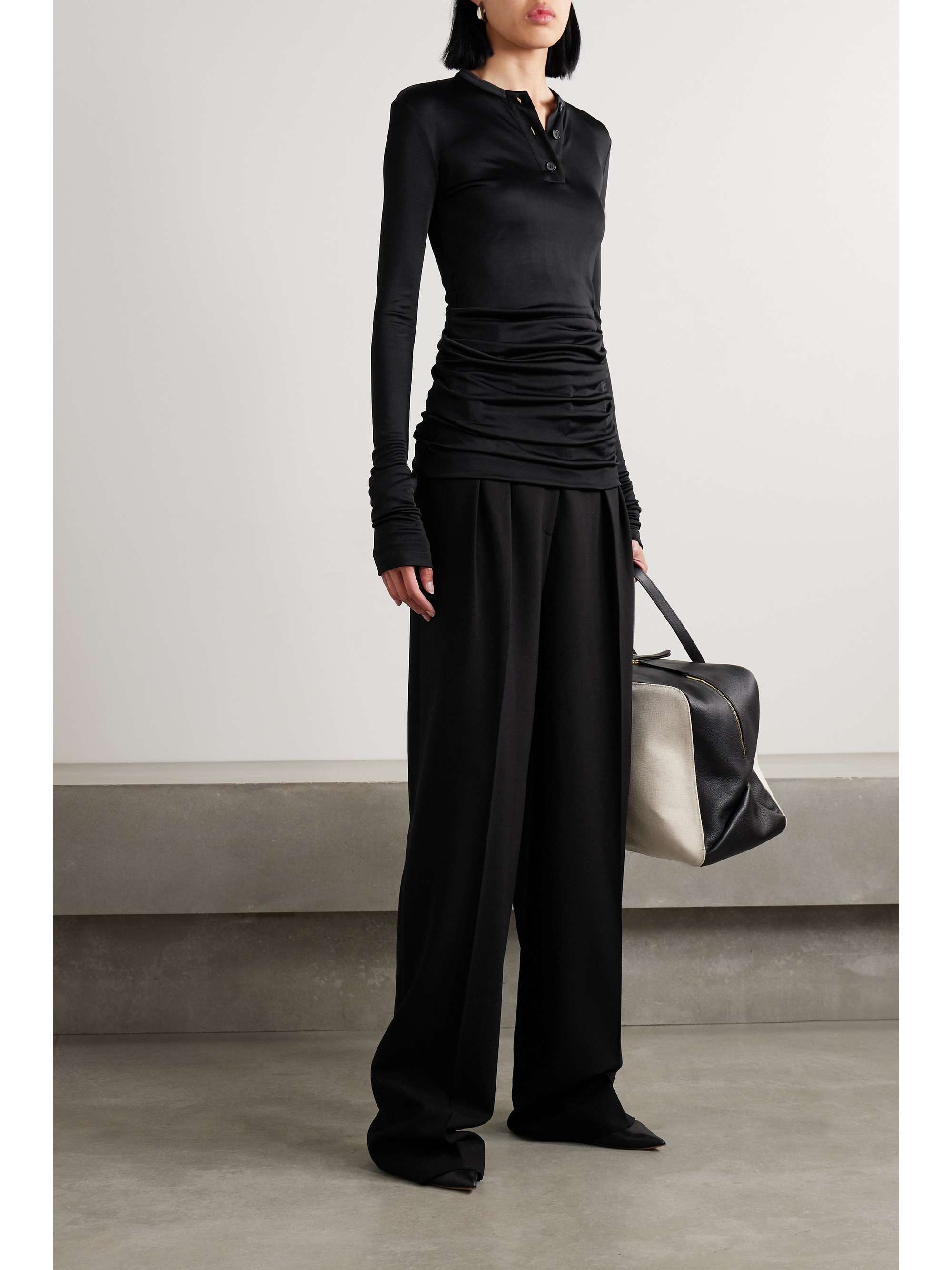 KHAITE Cessie pleated woven wide-leg pants | NET-A-PORTER