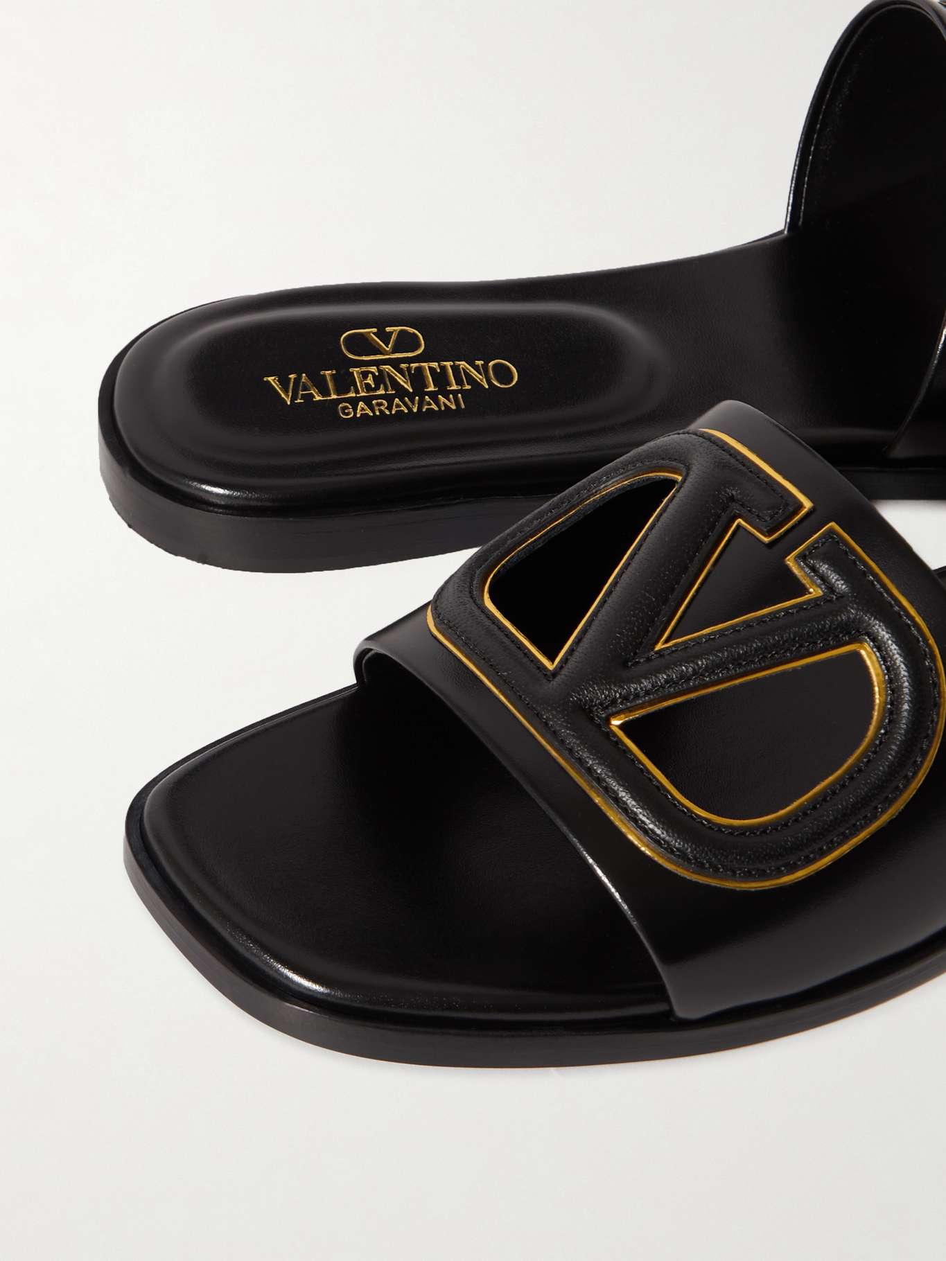 VALENTINO GARAVANI VLOGO cutout leather slides | NET-A-PORTER
