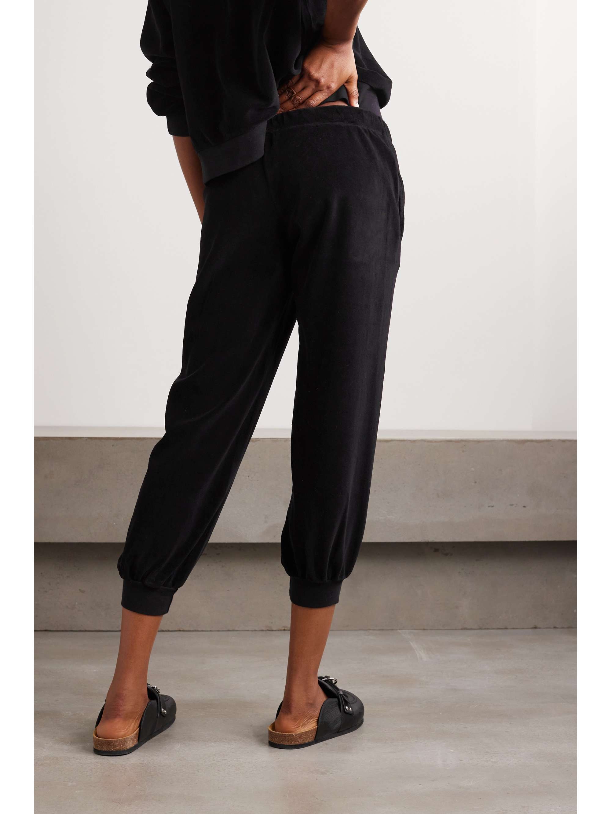 SUZIE KONDI Patmos cropped cotton-blend velour track pants | NET-A-PORTER