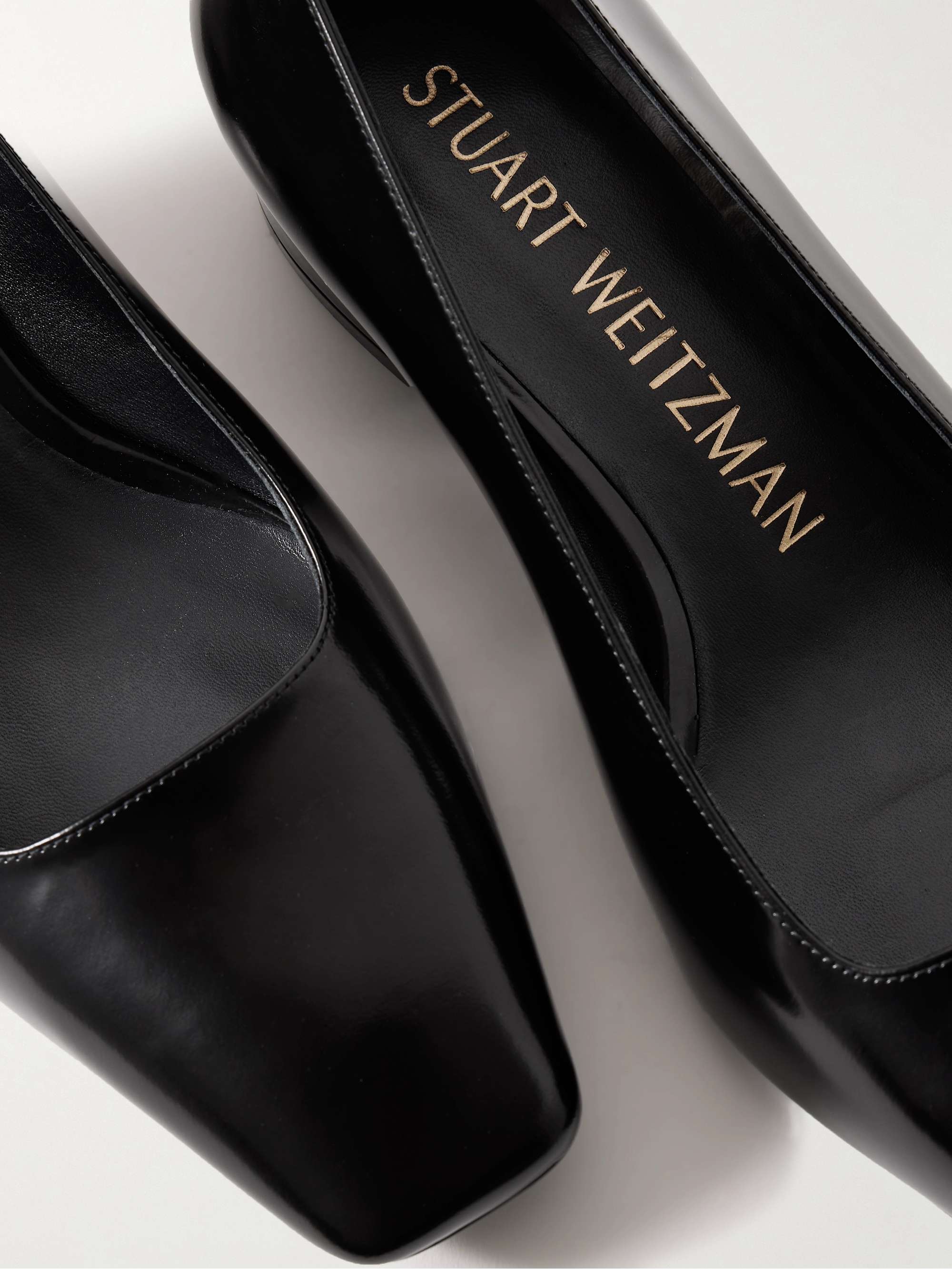 STUART WEITZMAN Vera glossed-leather pumps | NET-A-PORTER