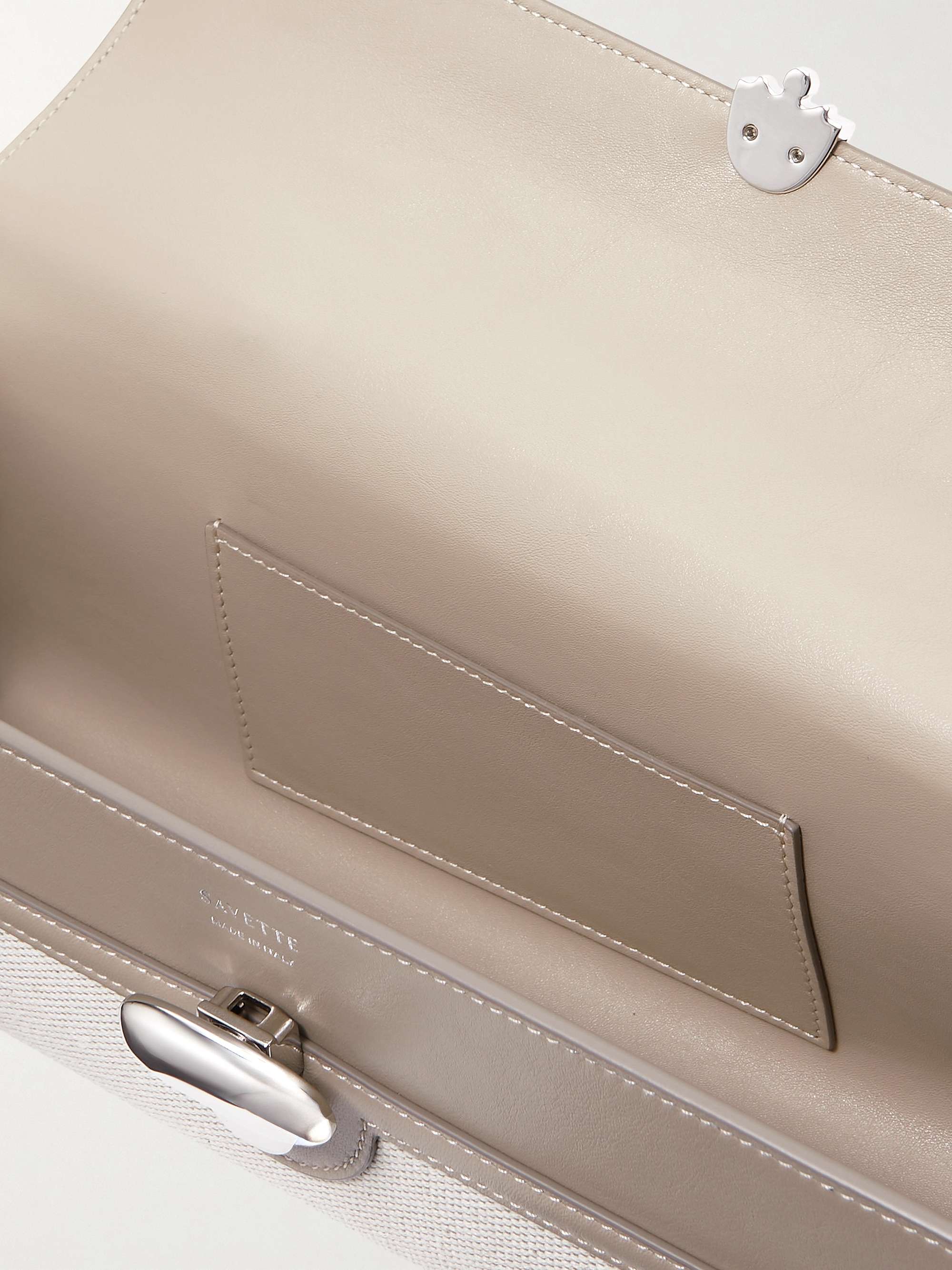SAVETTE Slim Symmetry canvas-trimmed leather clutch | NET-A-PORTER