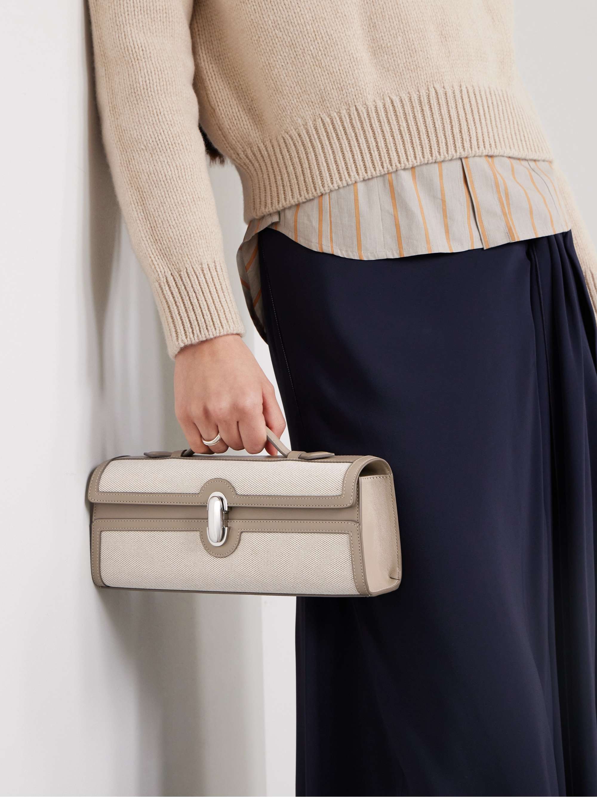 SAVETTE Slim Symmetry canvas-trimmed leather clutch | NET-A-PORTER