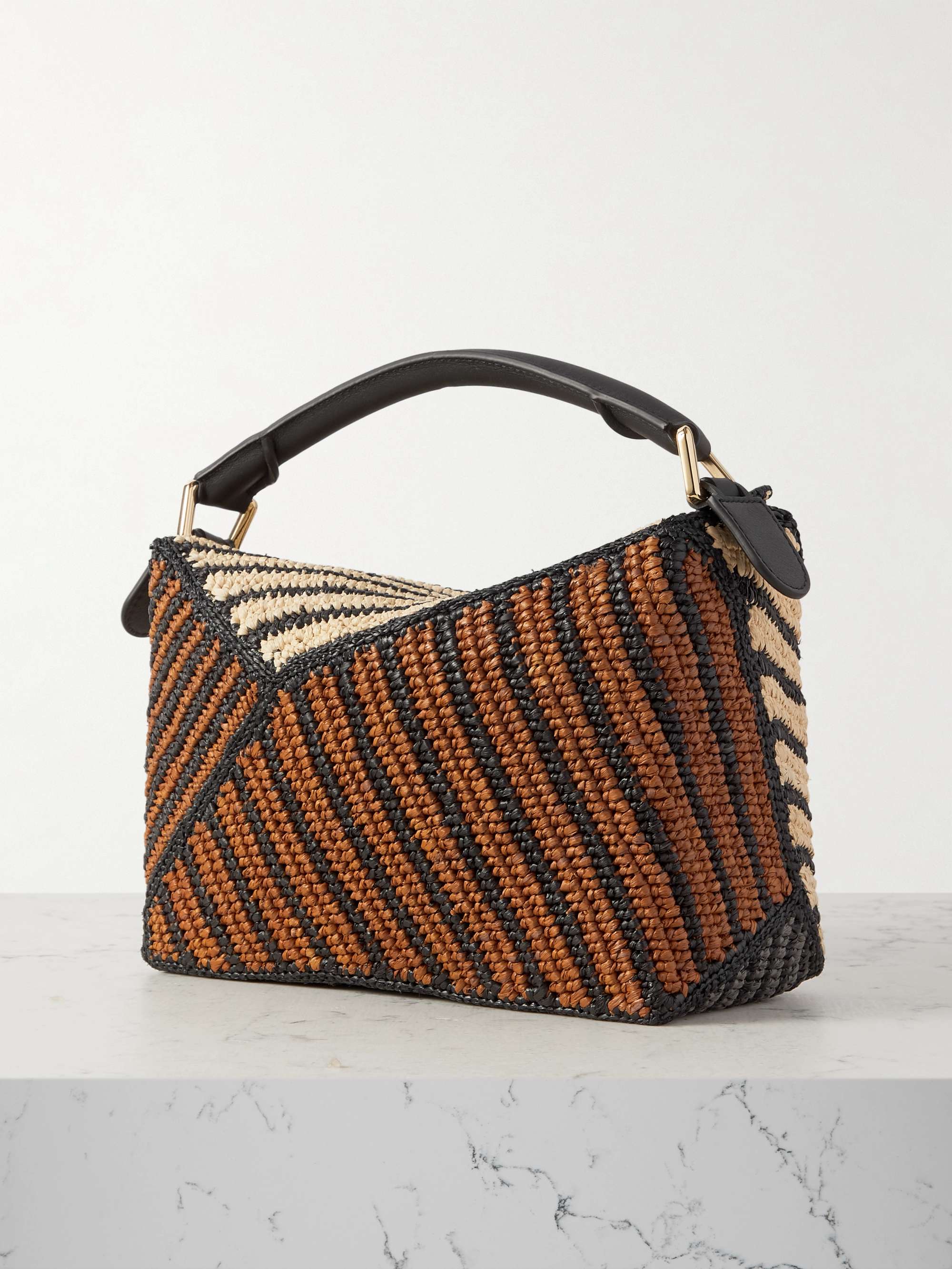 LOEWE + Paula's Ibiza Puzzle Edge small leather-trimmed striped raffia ...