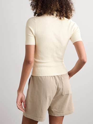 SPORTY & RICH Appliquéd ribbed-knit polo shirt | NET-A-PORTER