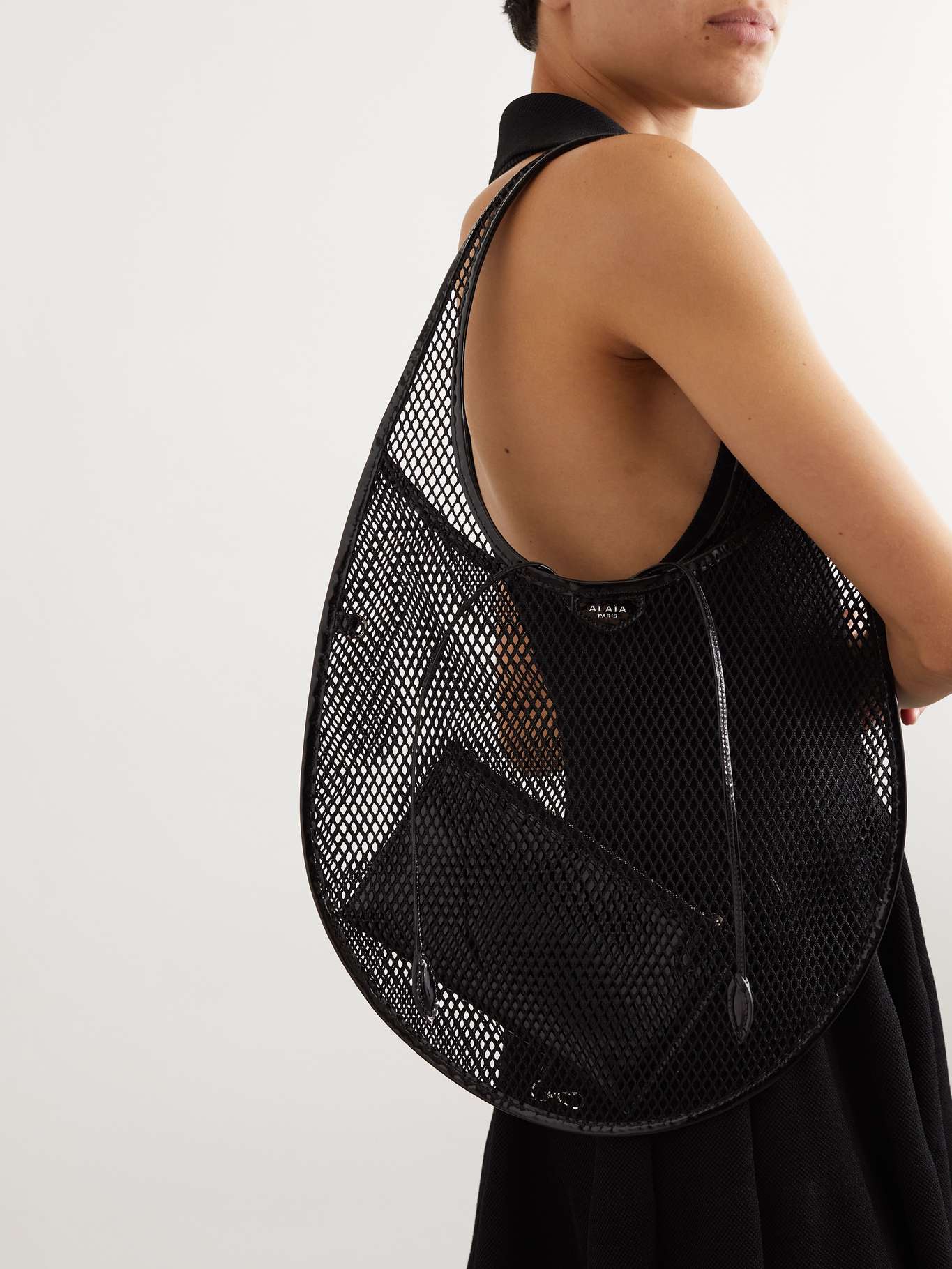 ALAÏA Patent-leather trimmed mesh shoulder bag | NET-A-PORTER