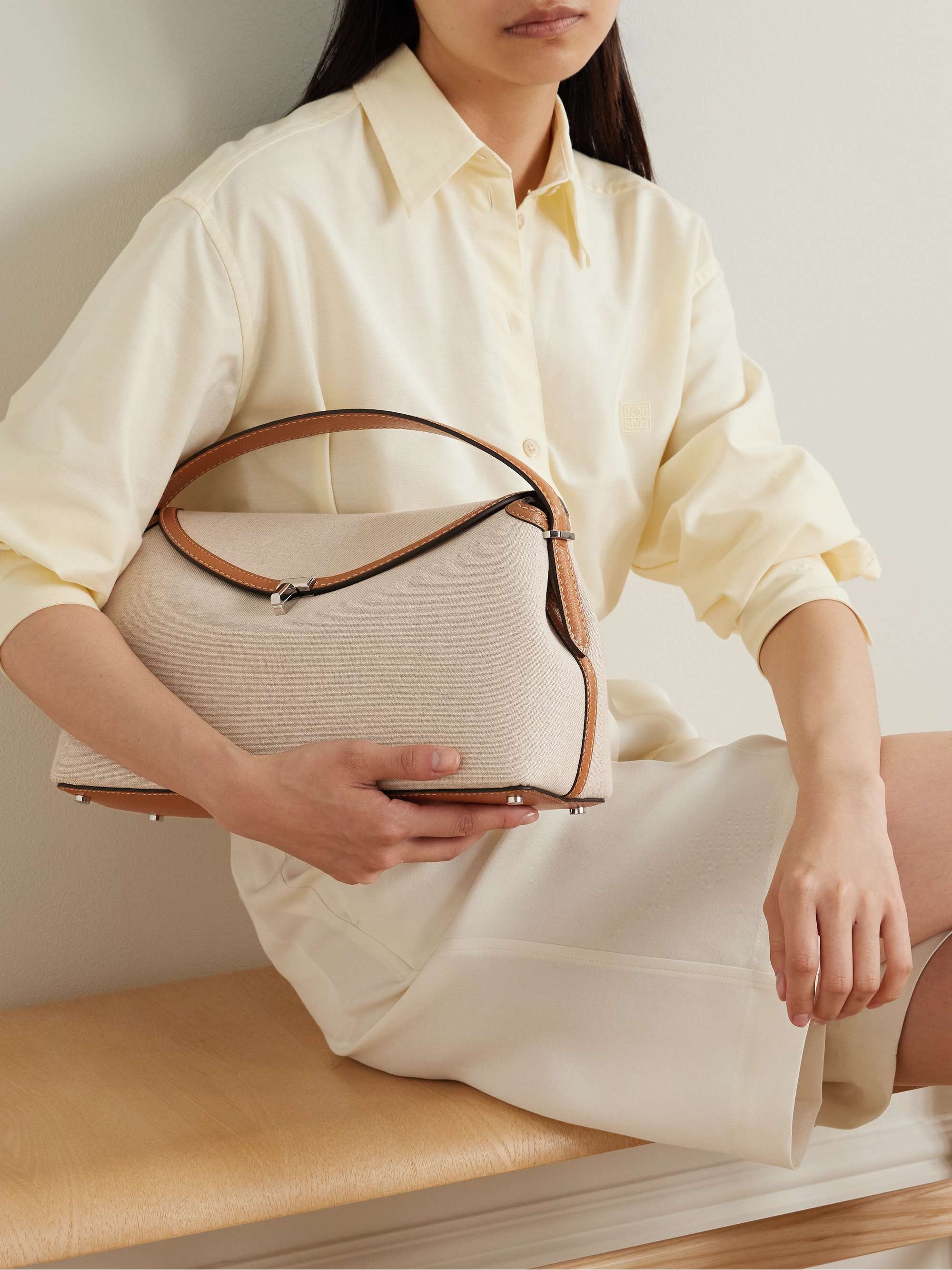 TOTEME T-Lock leather-trimmed cotton-canvas shoulder bag | NET-A-PORTER