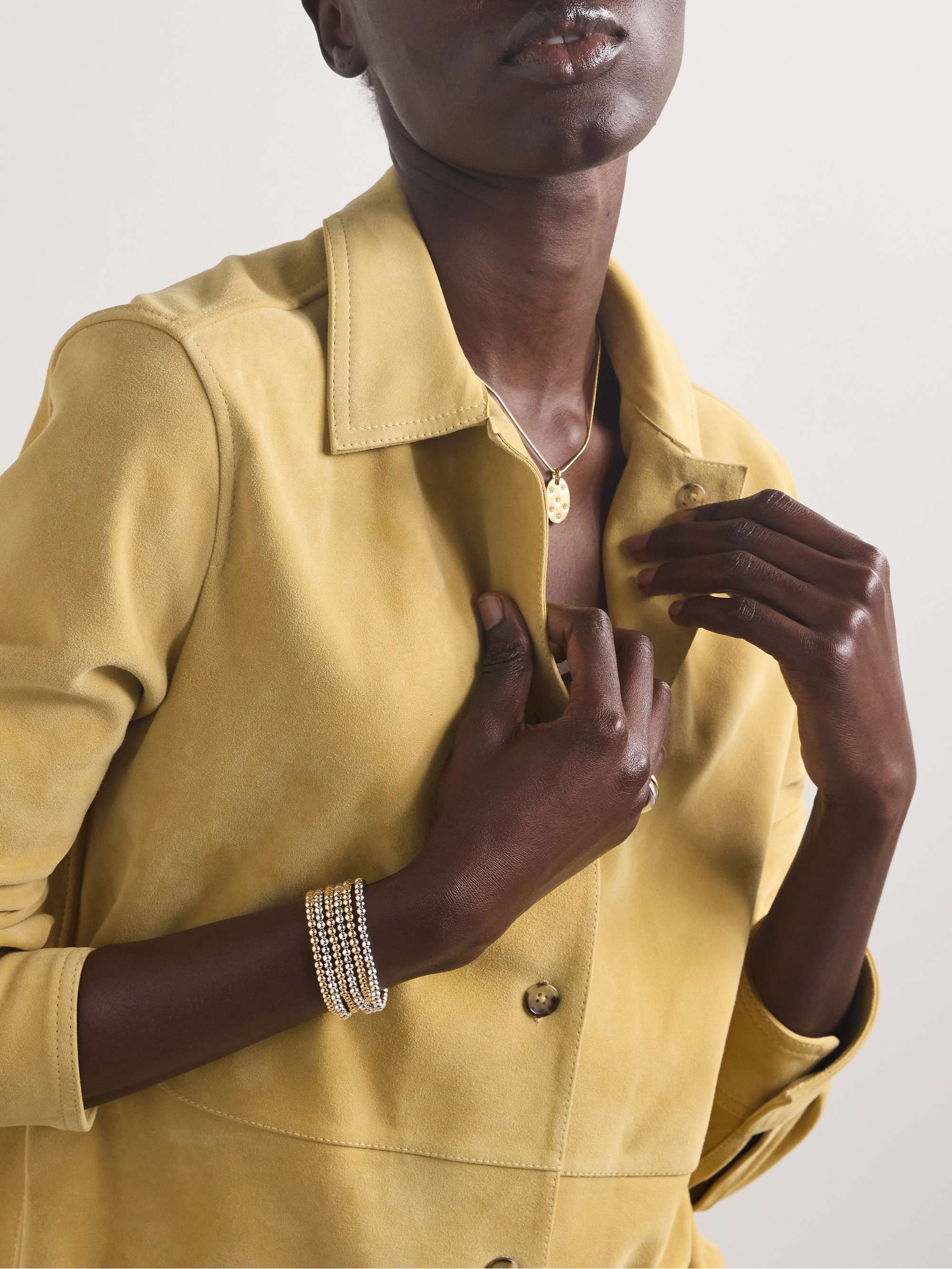 ROXANNE ASSOULIN Mixed Metals set of six gold and silver-tone bracelets ...