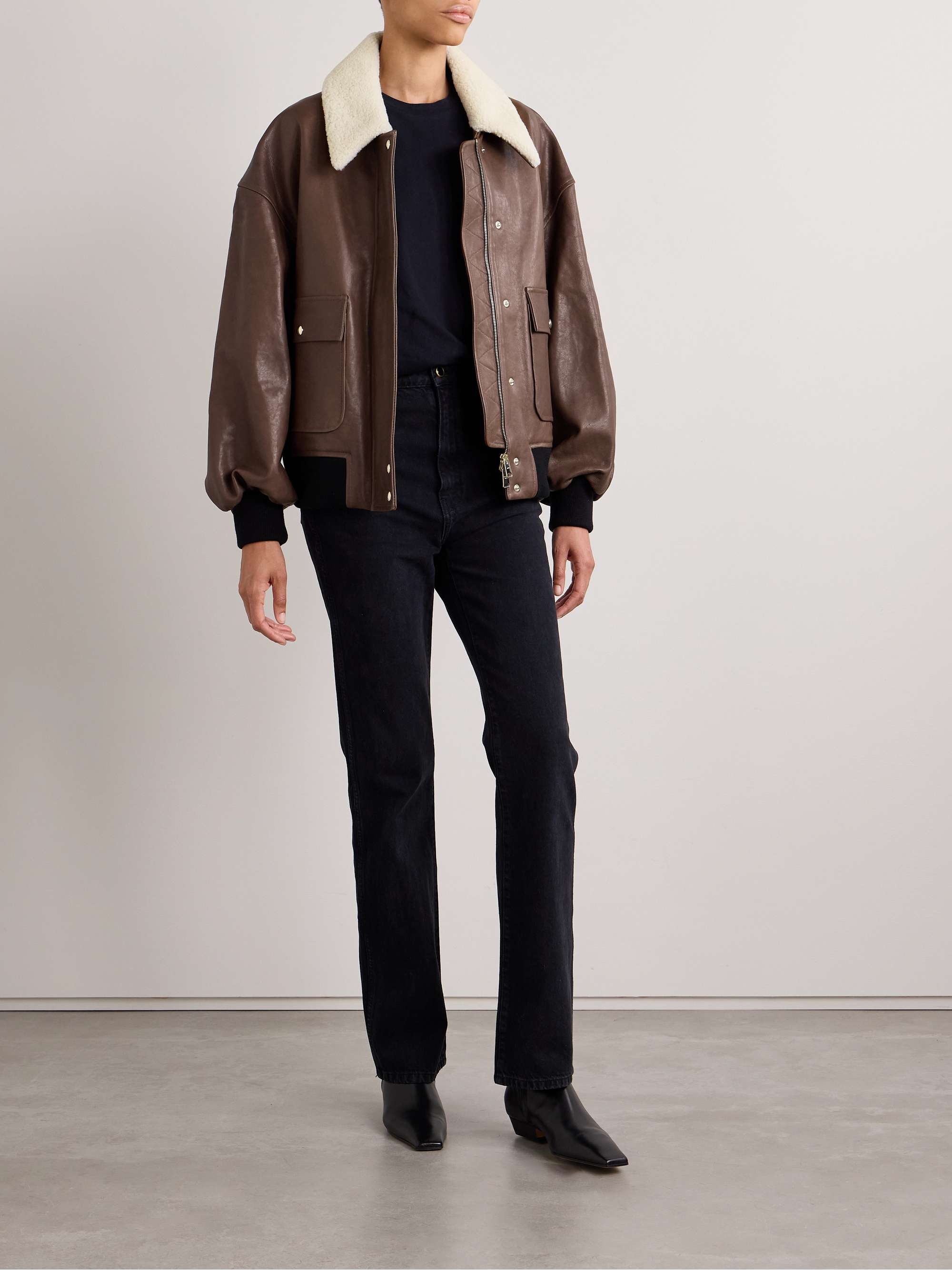 KHAITE Shellar oversized shearling-trimmed leather jacket | NET-A-PORTER