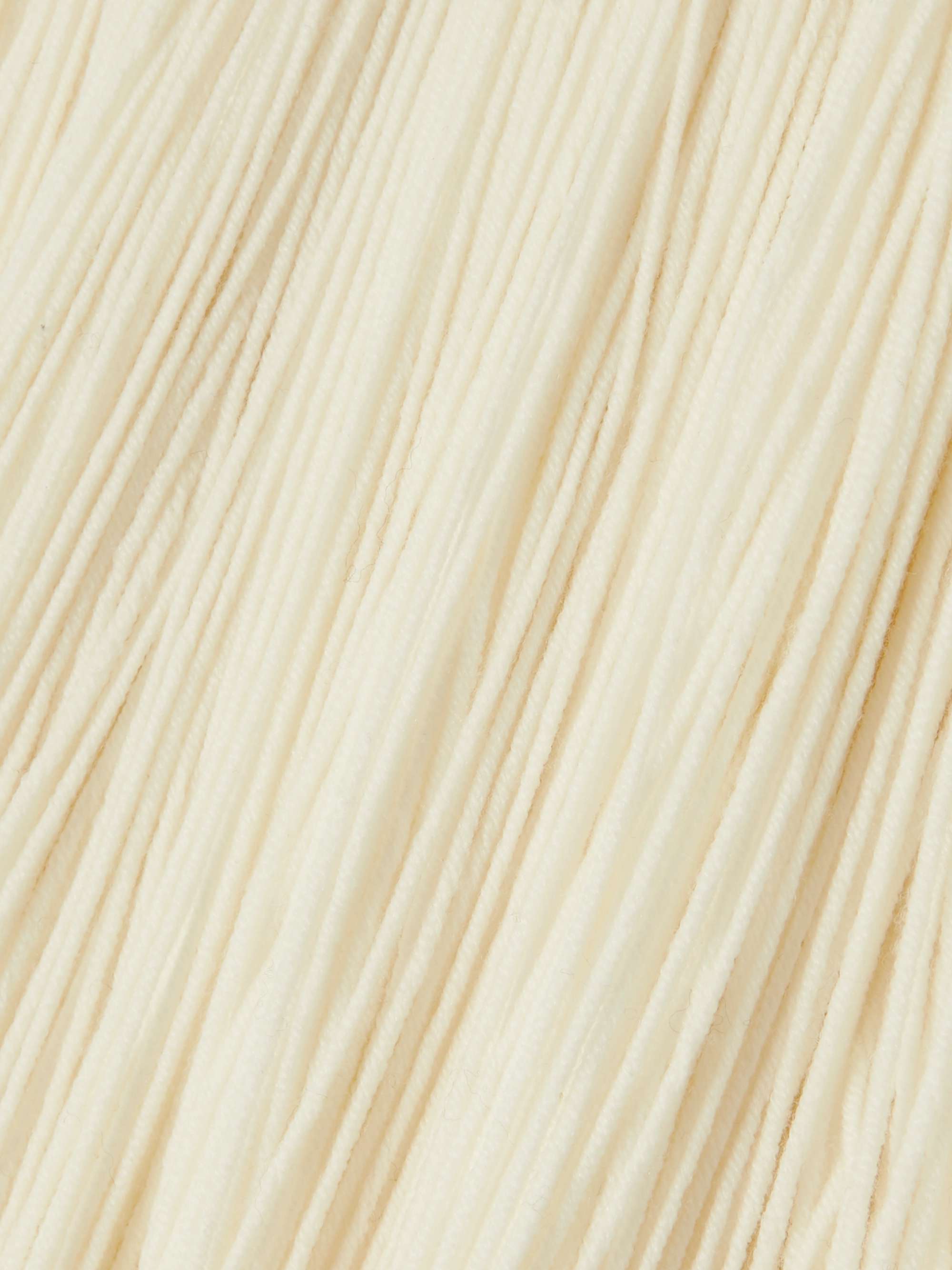 ALAÏA Fringed wool-blend turtleneck top | NET-A-PORTER