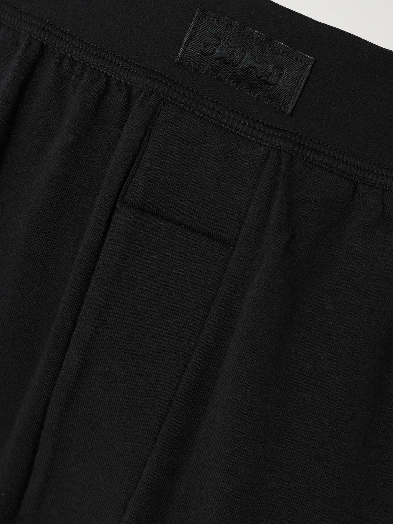 SKIMS Boyfriend stretch-modal and cotton-blend jersey track pants ...