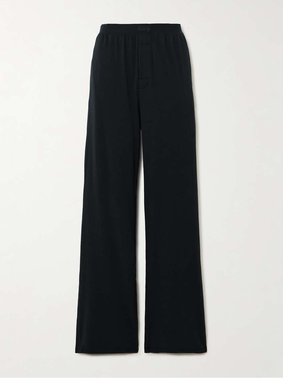 SKIMS Boyfriend stretch-modal and cotton-blend jersey track pants ...