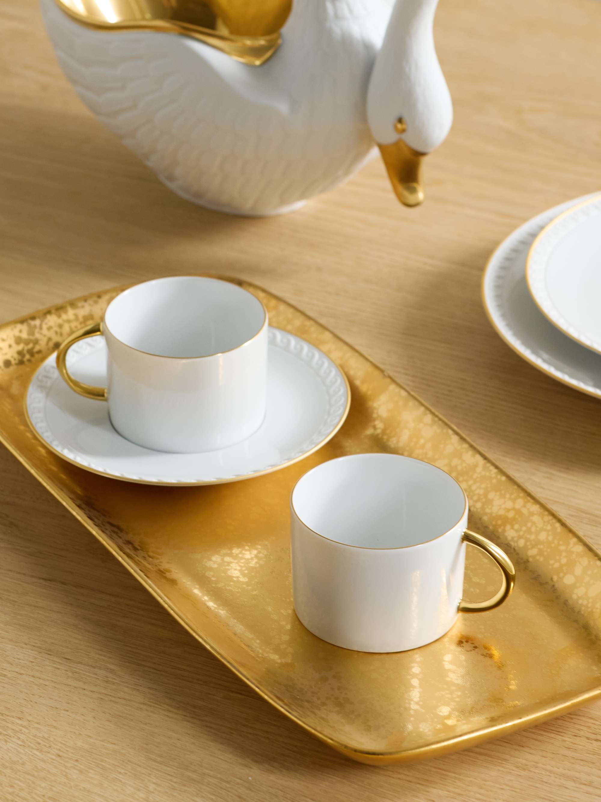 L'OBJET Neptune set of two gold-plated porcelain tea cups and saucers ...