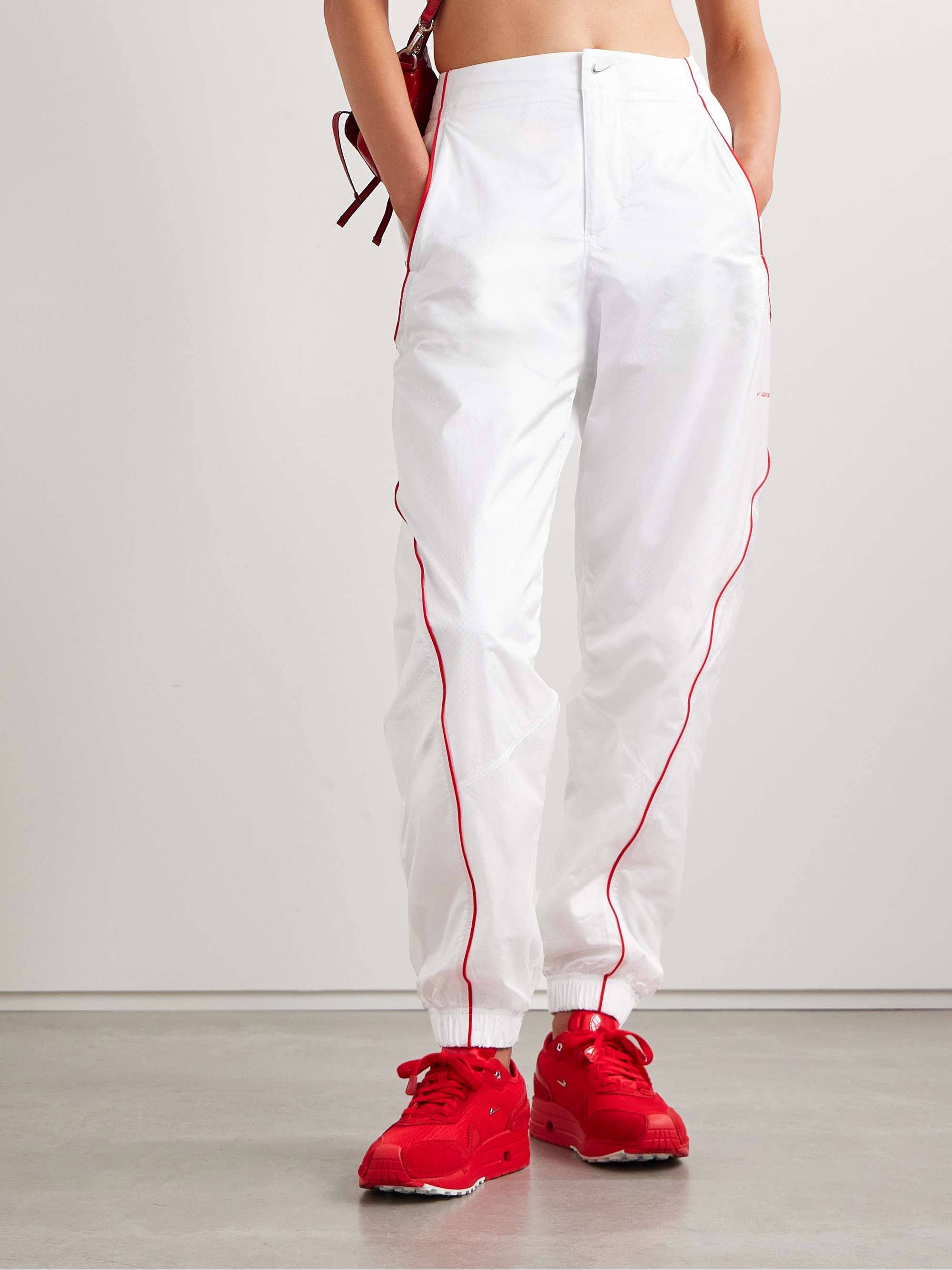 NIKE + Jacquemus NRG striped shell tapered track pants | NET-A-PORTER