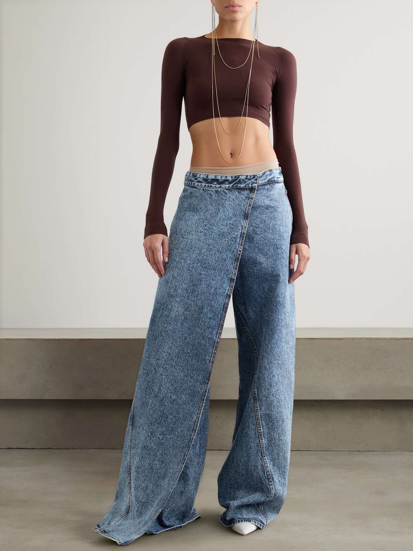 ALAÏA Asymmetric wide-leg jeans | NET-A-PORTER