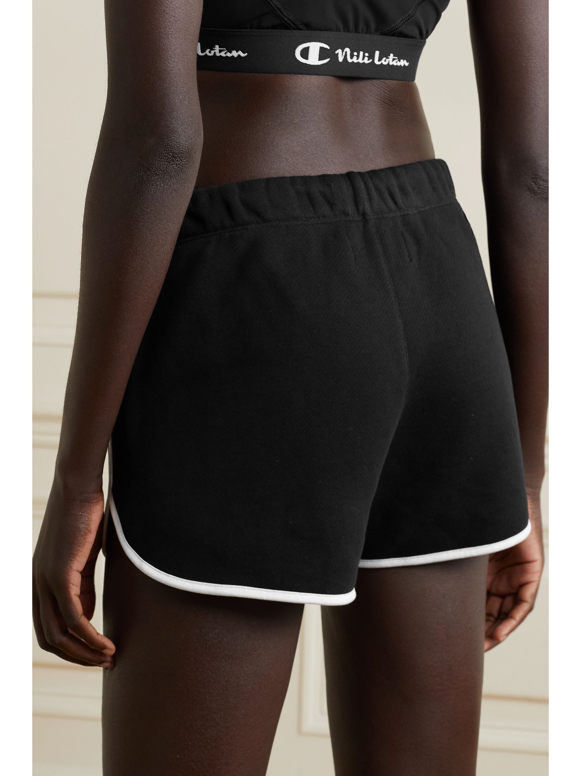 Black + Champion appliquéd cotton-jersey shorts | NILI LOTAN | NET-A-PORTER