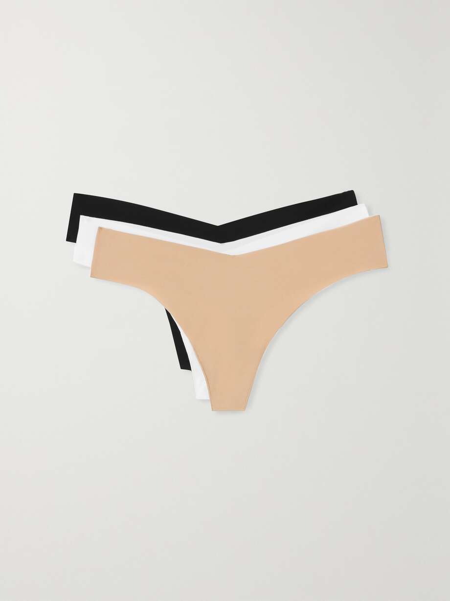 COMMANDO Set of three stretch thongs | NET-A-PORTER