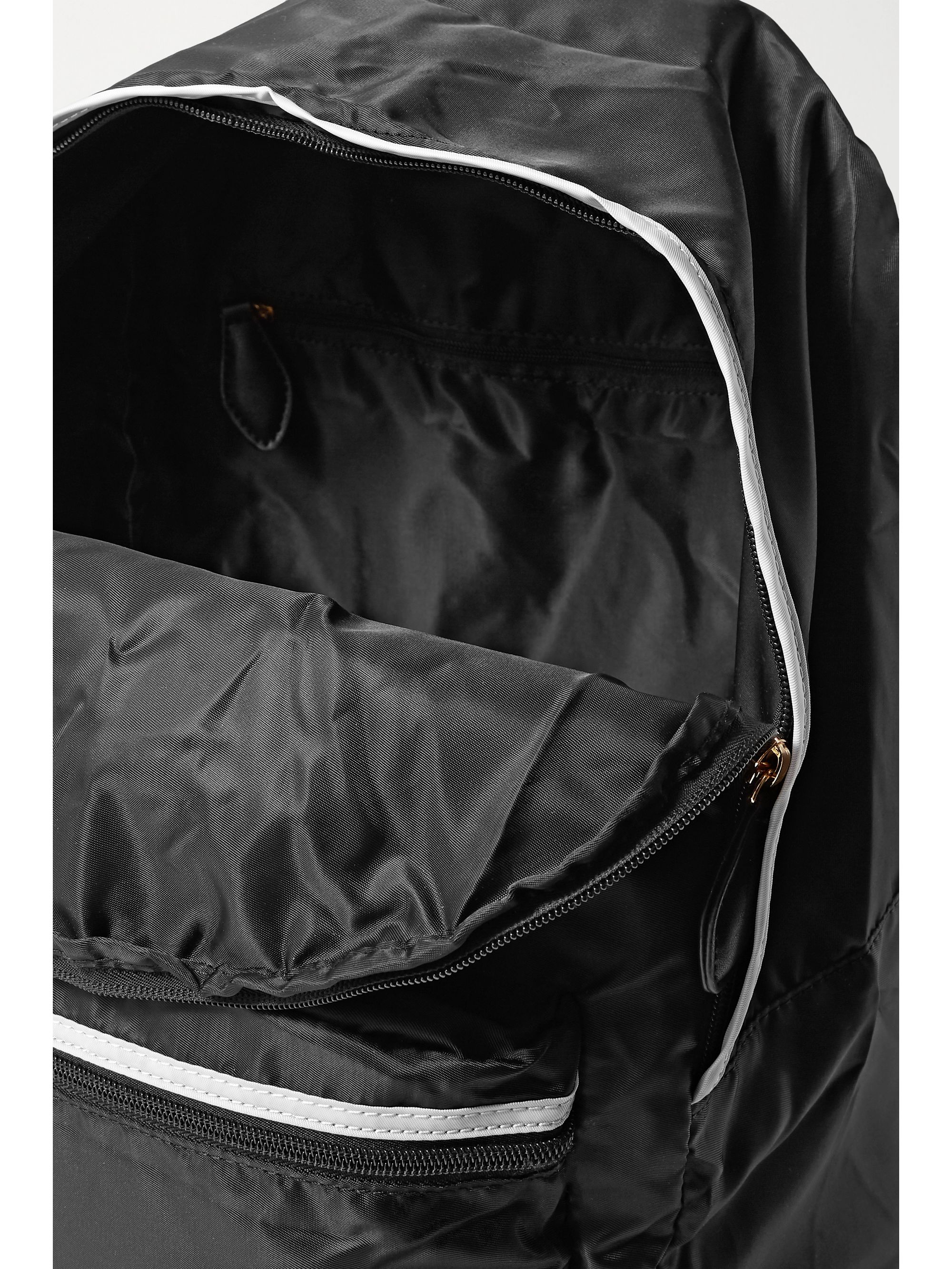 Black Fold-Up leather and grosgrain-trimmed shell backpack | PARAVEL ...