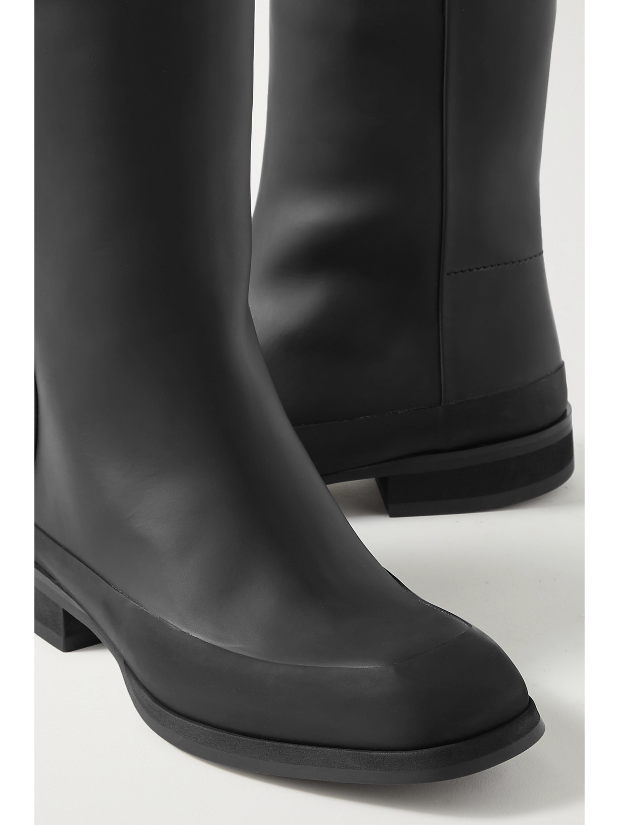 The Row Grunge Flat Leather Ankle Boots In Black | ModeSens