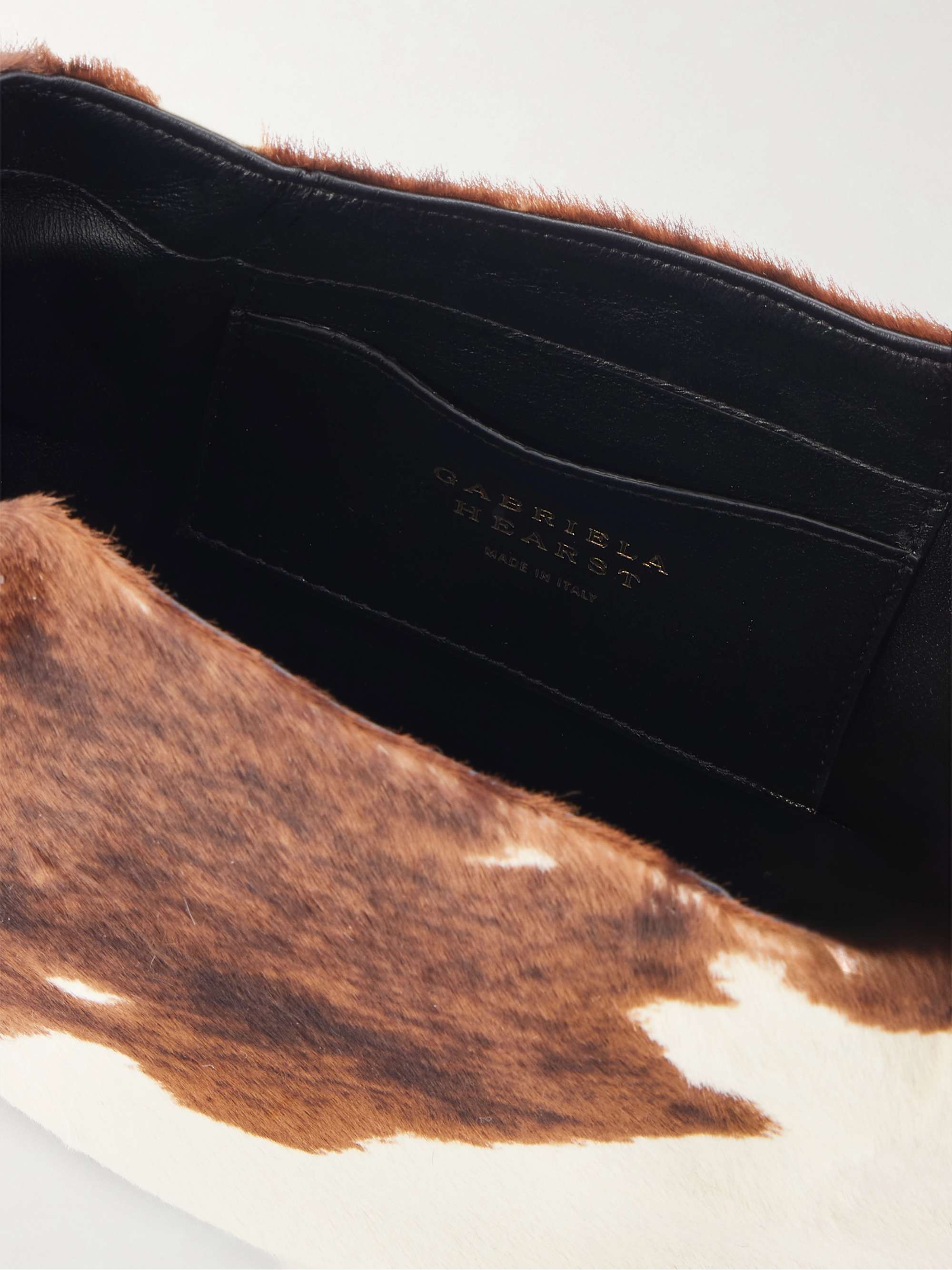 GABRIELA HEARST Soft Demi cow-print calf hair clutch | NET-A-PORTER